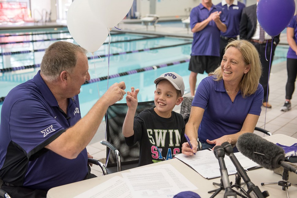 TCU Swimming signs 8-year-old fighting tumor - TCU Magazine